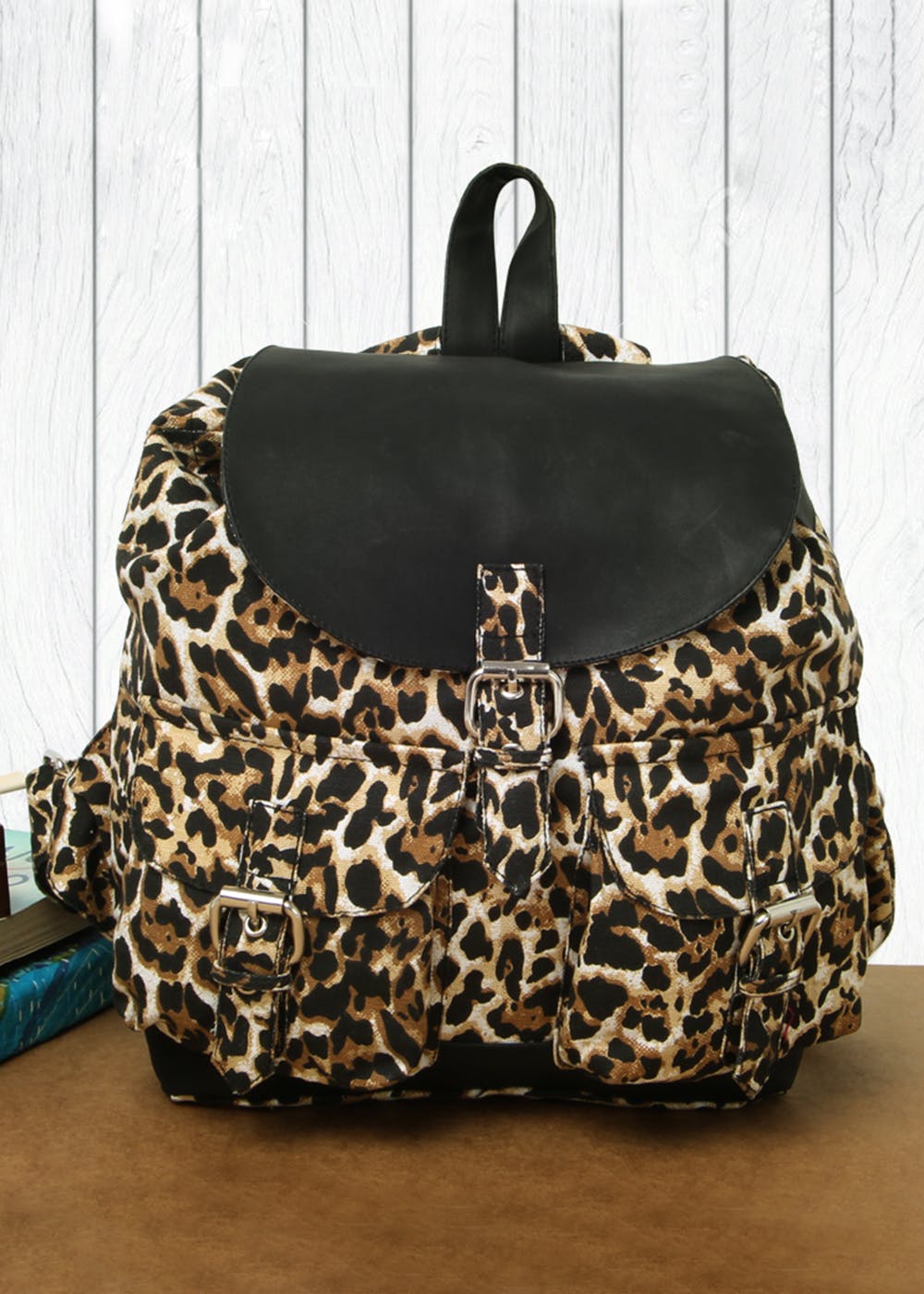 Get Contrast Solid Flap Detail Animal Printed Backpack at ₹ 699 | LBB Shop
