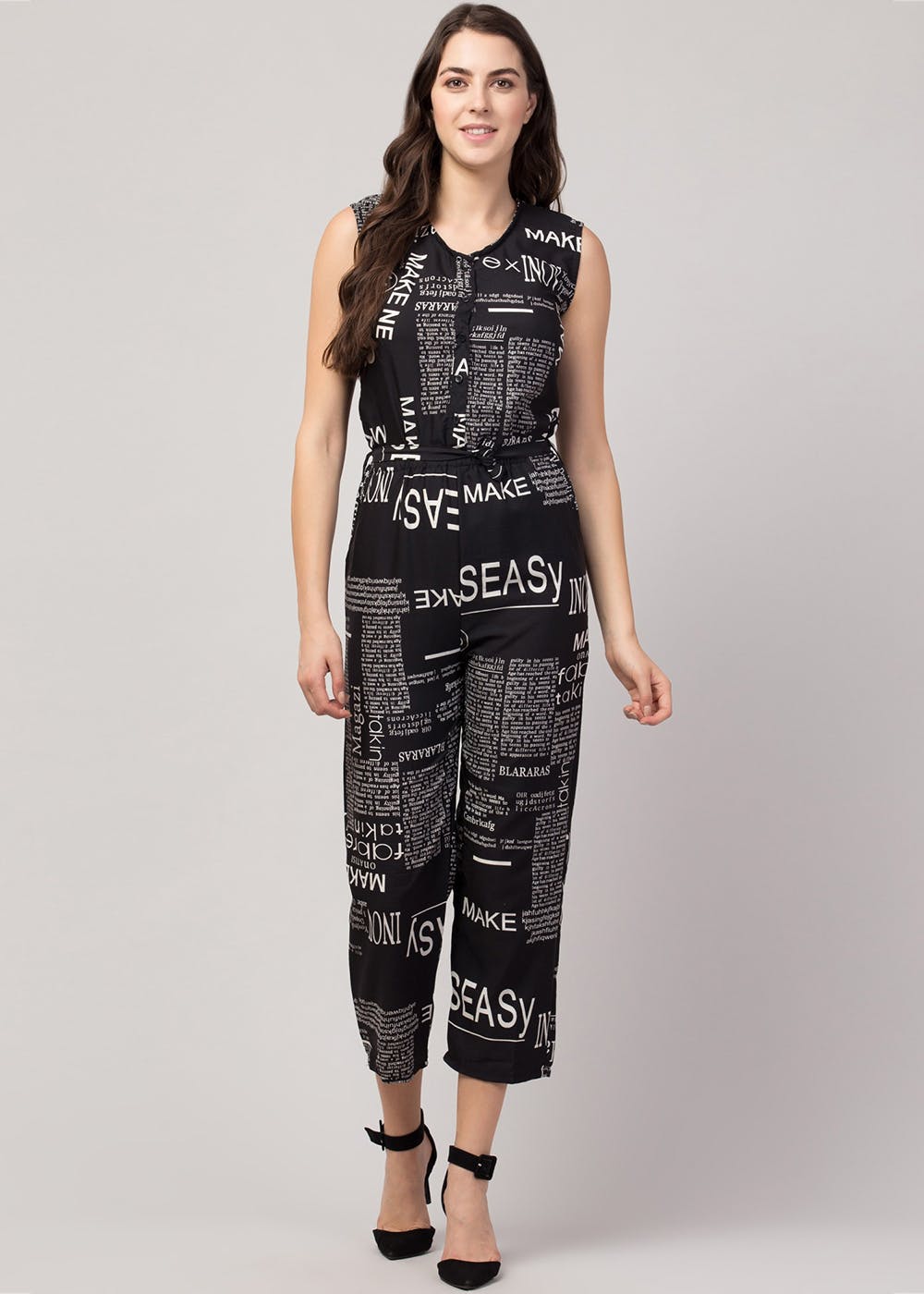 Get Typographic Newspaper Effect Classic Sleeveless Jumpsuit at ₹ 890 ...