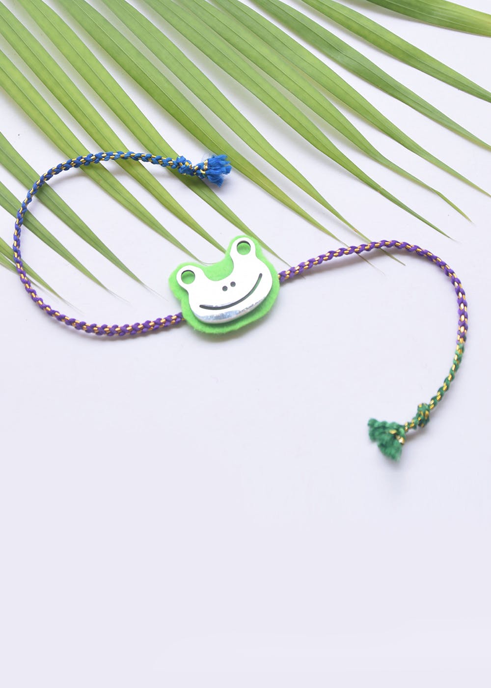 Get Steel Cut Frog Rakhi at ₹ 490 | LBB Shop