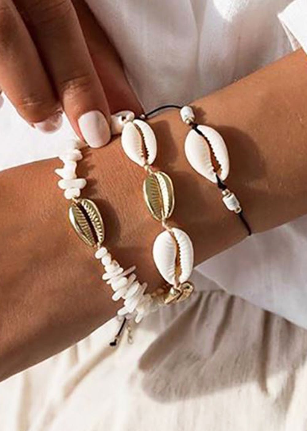 Get set-of-3-adjustable-white-and-gold-shells-bracelets at ₹ 499 | LBB Shop