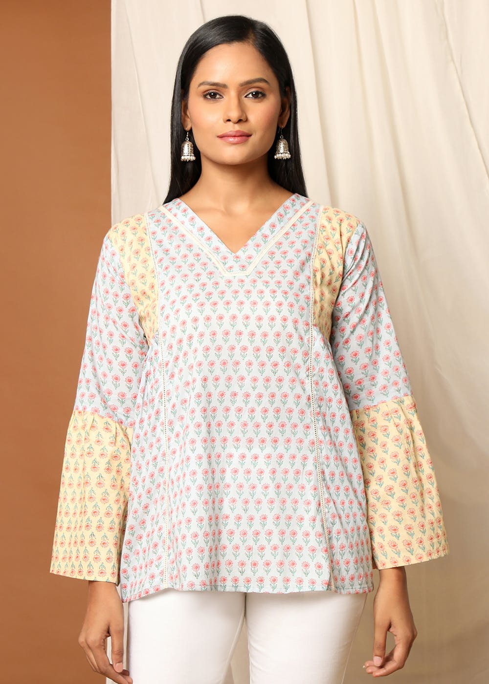 Get Side Pleats Detail Floral Printed Blue and Yellow Top at ₹ 1339 ...