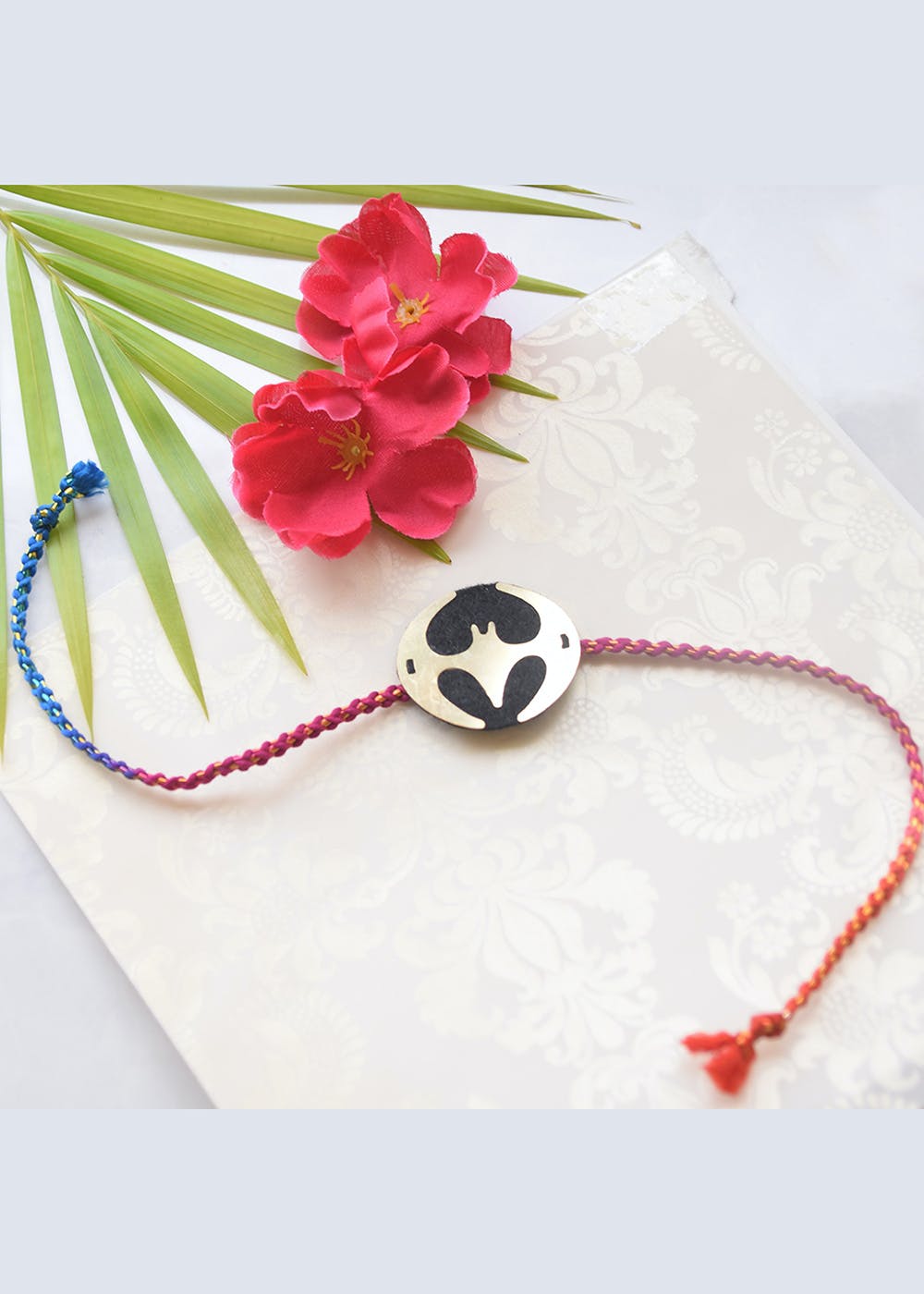 Get Brass Cut Batman Rakhi at ₹ 490 | LBB Shop