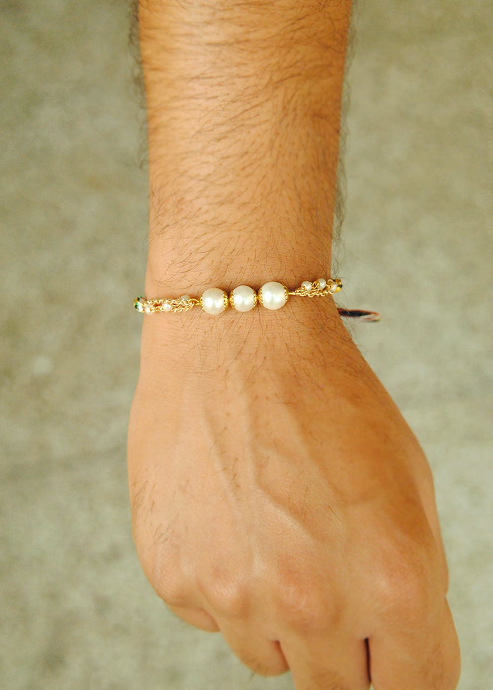 Get Pearl Embellished Gold Chain Rakhi at ₹ 149 | LBB Shop