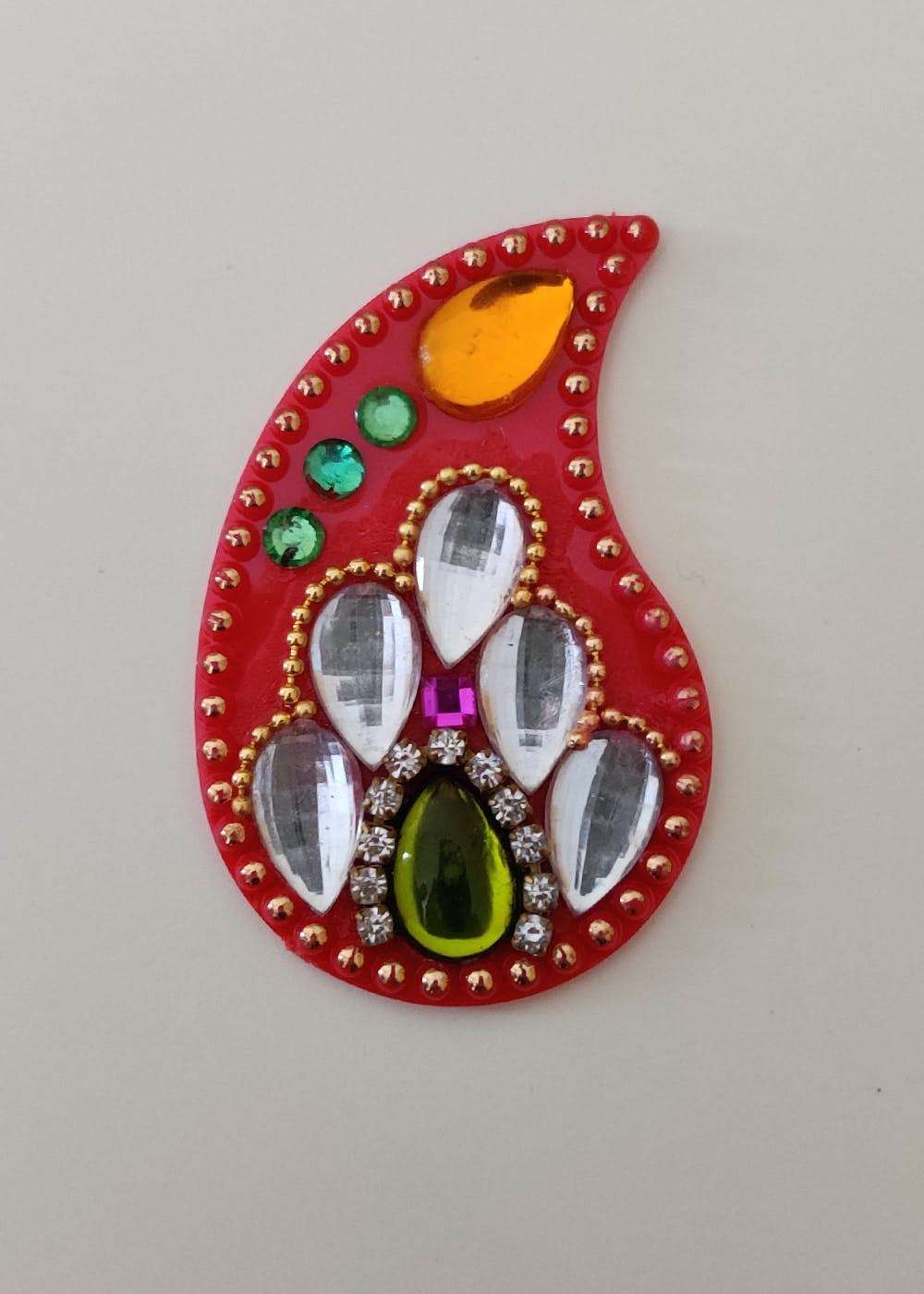 Get Multi Stone Embellished Acrylic Diya Shaped Rangoli at ₹ 300 | LBB Shop