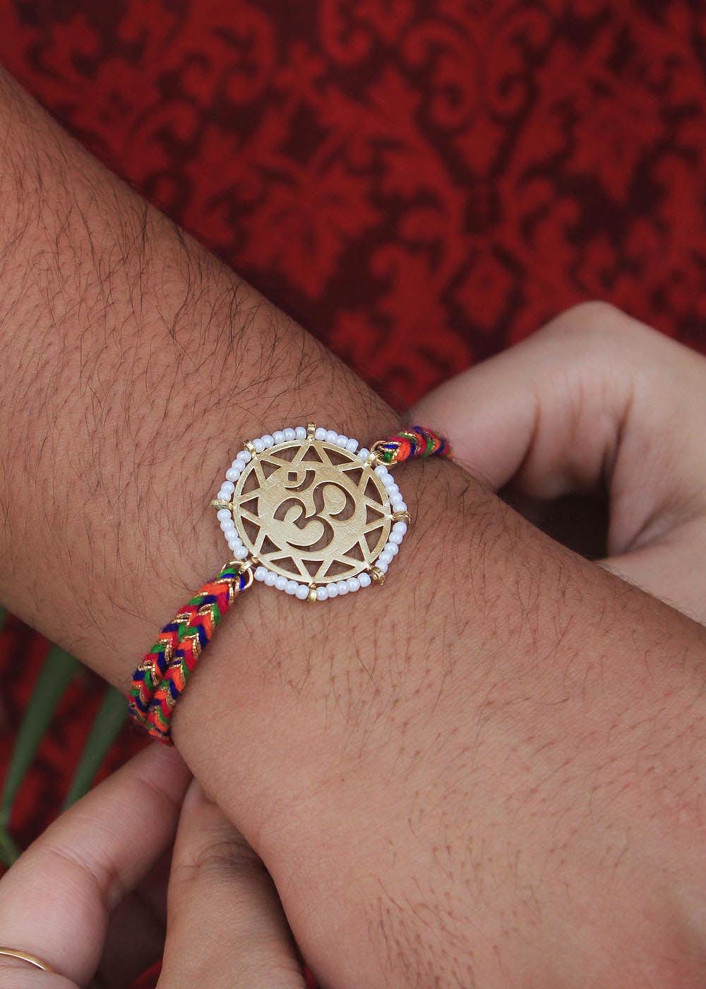 Get Golden Beaded Om Rakhi at ₹ 300 | LBB Shop