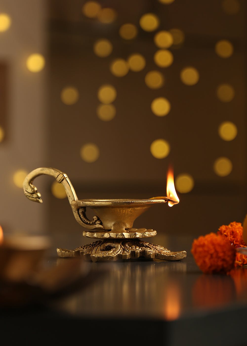 Get Brass Diya With Handle And Intricate Base at ₹ 2168 | LBB Shop