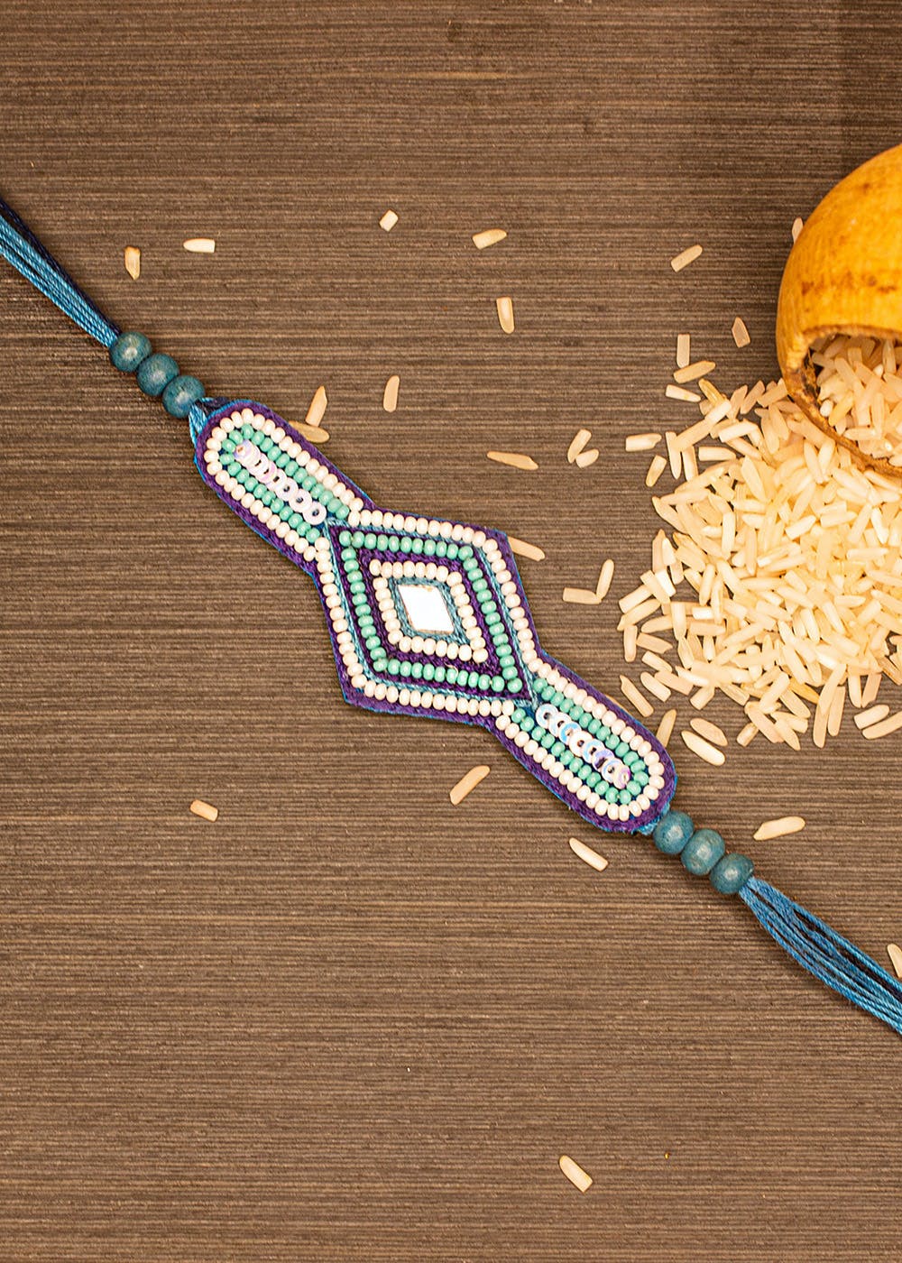 Get Barfi Hand Embroidered Rakhi at ₹ 450 | LBB Shop