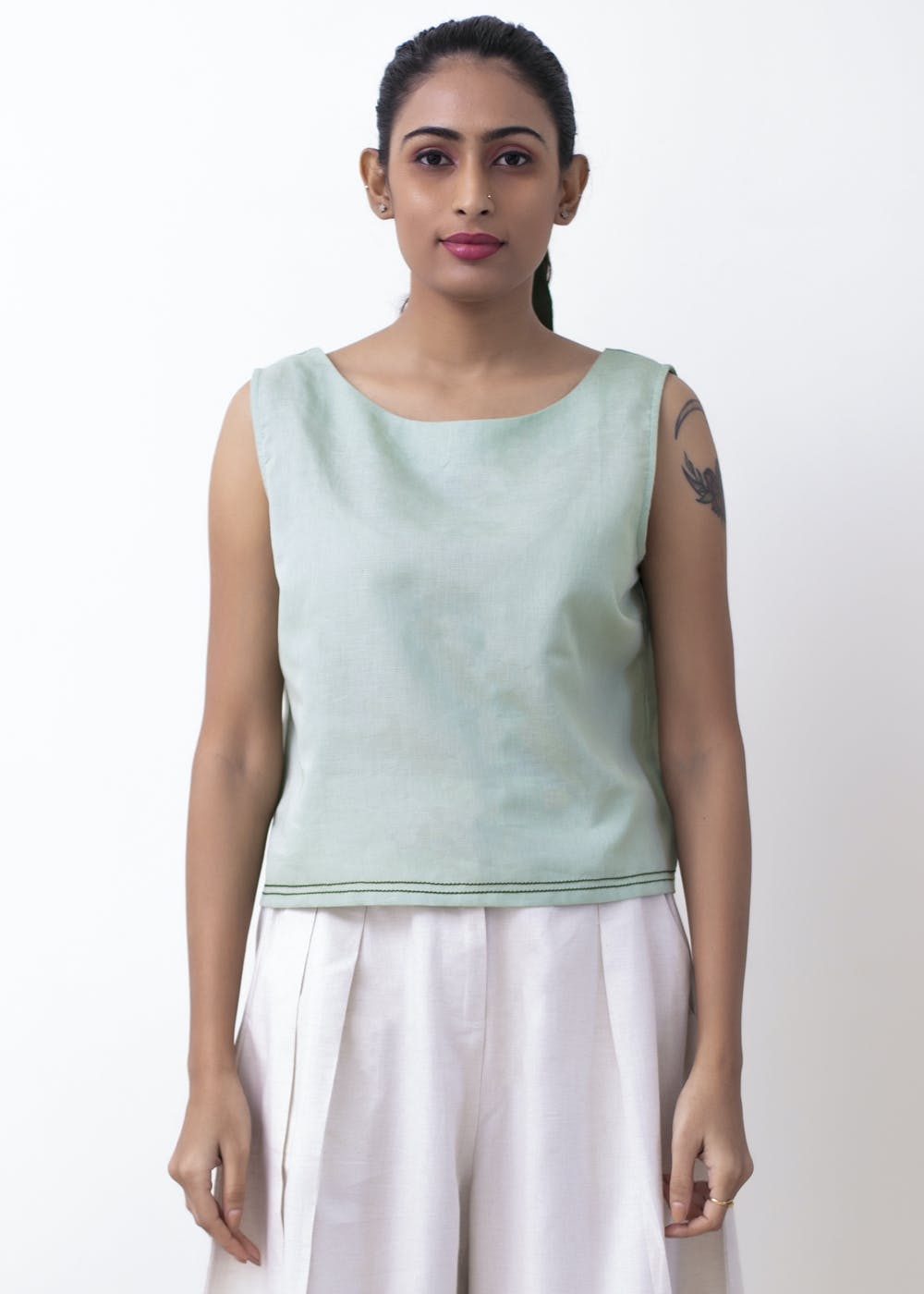 Get Piping Hem Detail Solid Sleeveless Crop Top at ₹ 1270 | LBB Shop