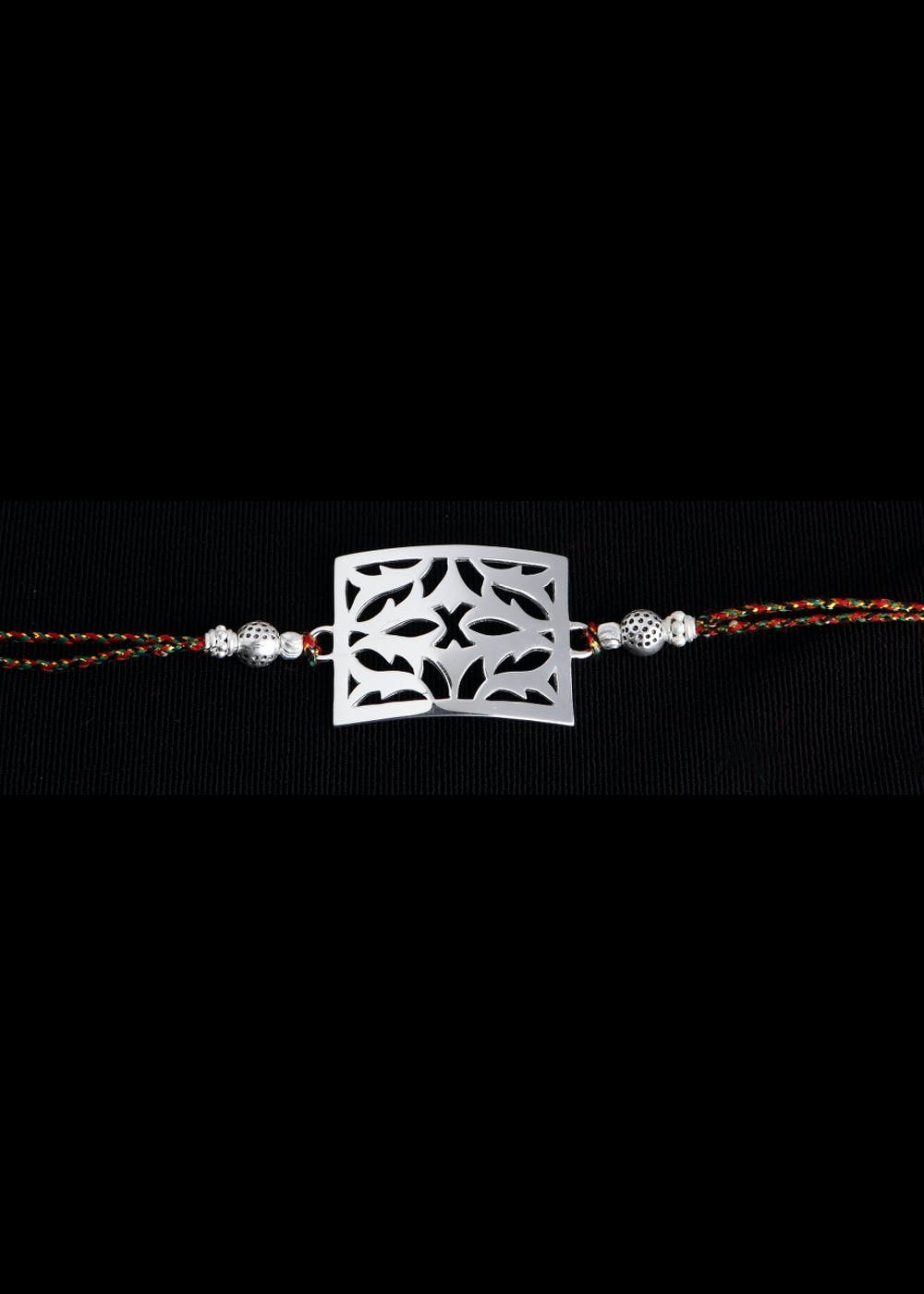 Get Silver Plated Cut Out Pattern Rectangular Rakhi at ₹ 410 | LBB Shop