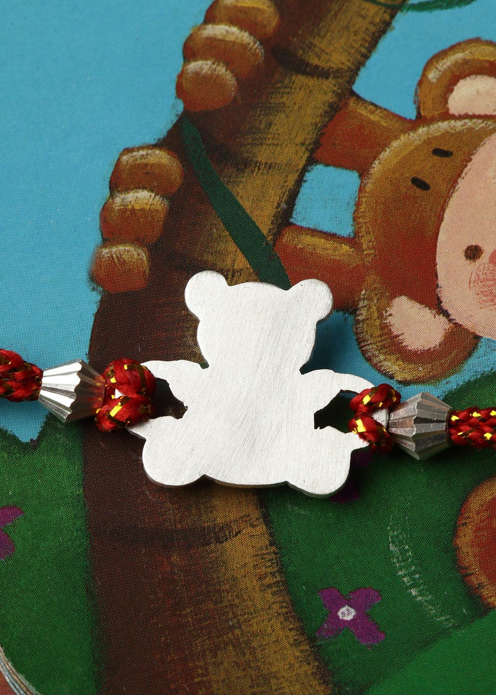 Get Silver Plated Bear Rakhi at ₹ 360 | LBB Shop