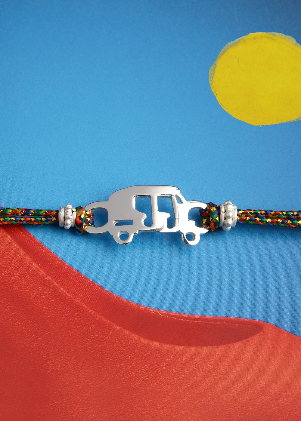 Get Silver Plated Auto Rickshaw Rakhi at ₹ 360 | LBB Shop