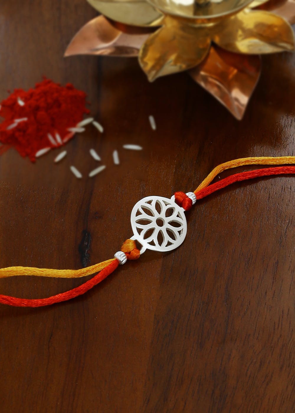 Get Silver Plated Sunflowers Rakhi at ₹ 410 | LBB Shop