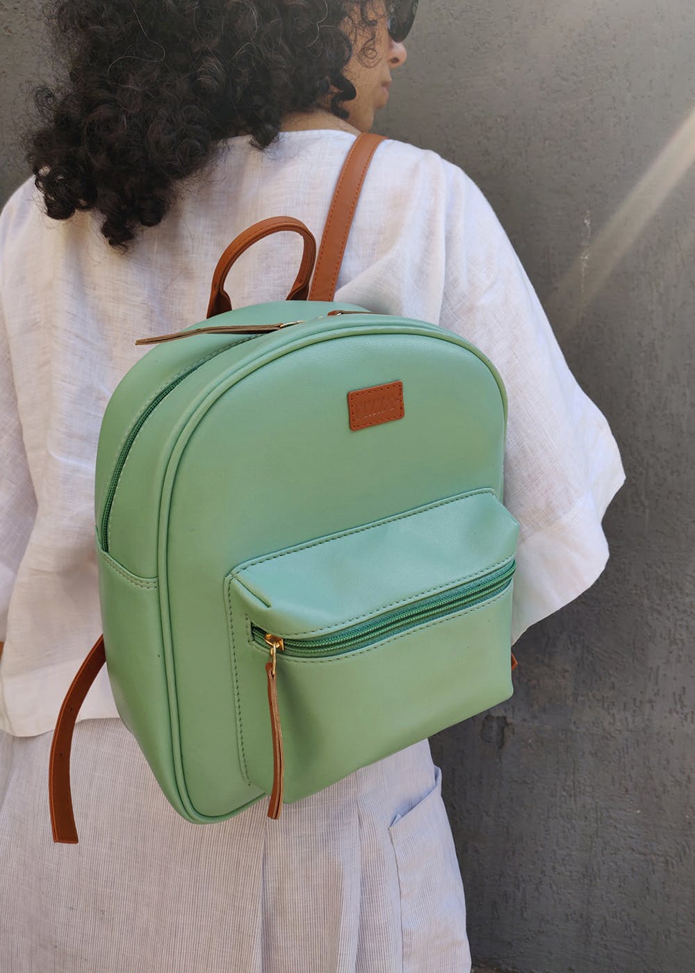 Get Turquoise Tan Backpack at ₹ 1620 | LBB Shop