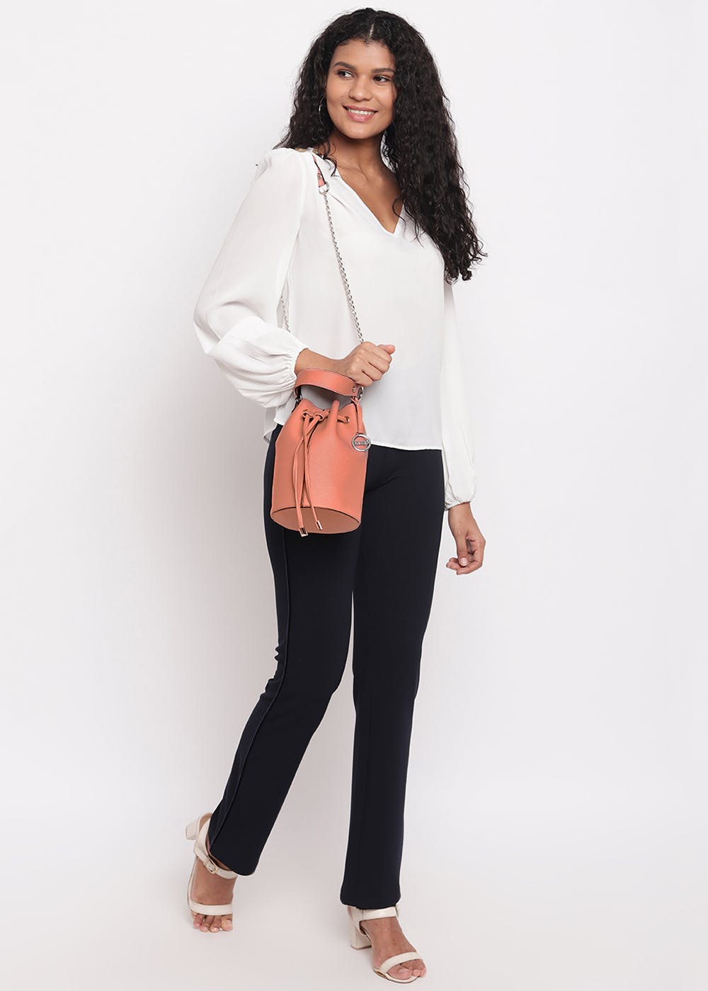 Get Peach Stylish Small Bucket Sling Bag at ₹ 1377 | LBB Shop
