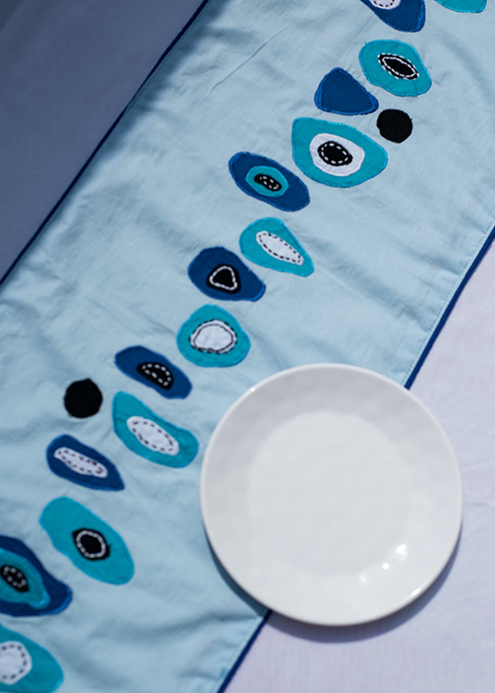 Get Evil Eye Table Runner 6 Seater at ₹ 929 | LBB Shop