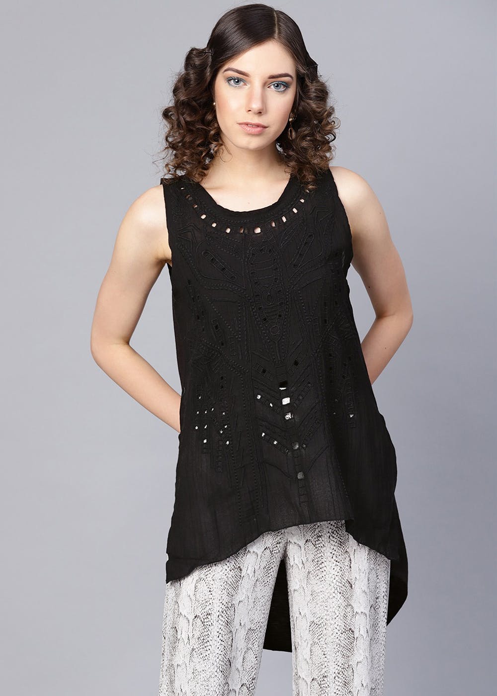 Get Laser Design Detail Off-White Sleeveless High-Low Top at ₹ 560 ...