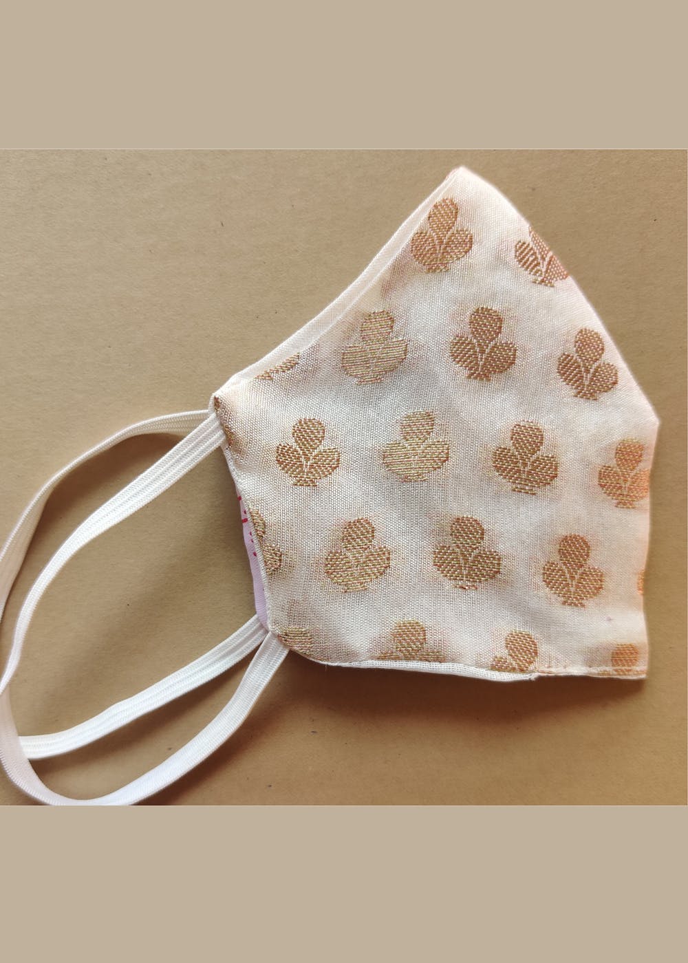 Get Pack of 2:Festive Double Layered Off White And Beige Mask at ₹ 420 ...