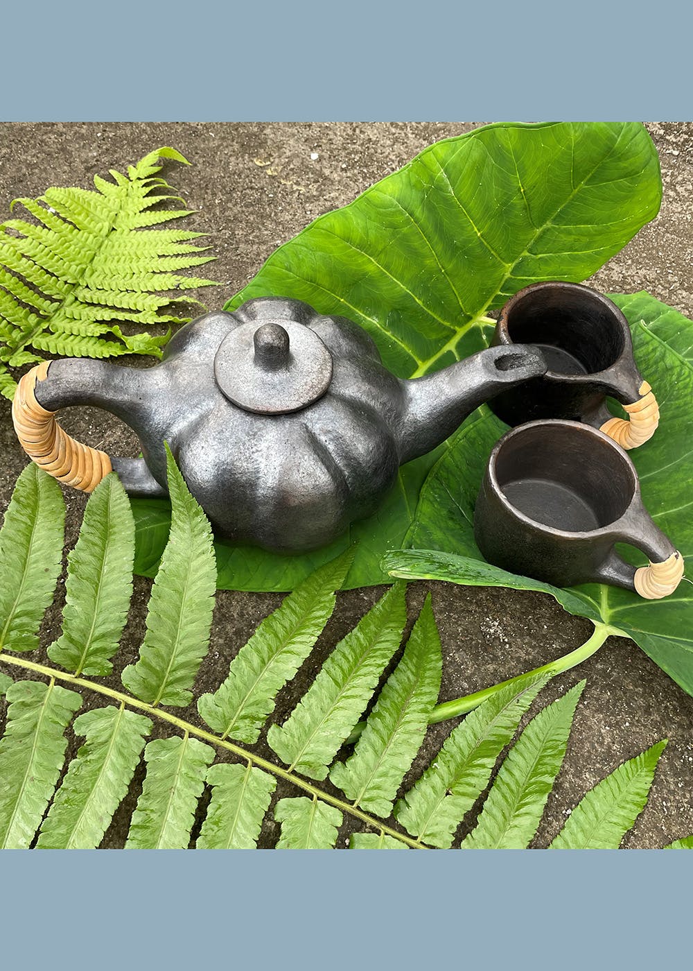 Get Longpi Black Pottery Tea Set - Pumpkin at ₹ 2499 | LBB Shop