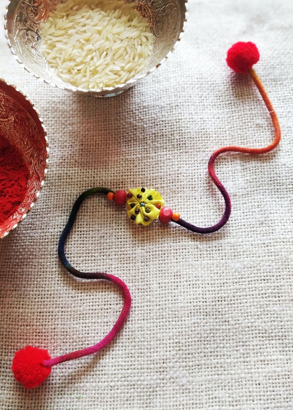 Get Yellow Small Flower Rakhi at ₹ 225 | LBB Shop