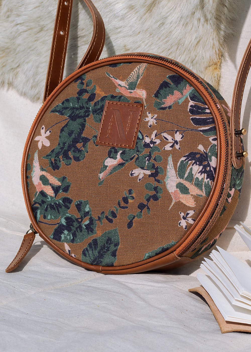 Get Round Brown Printed Sling at ₹ 1450 | LBB Shop