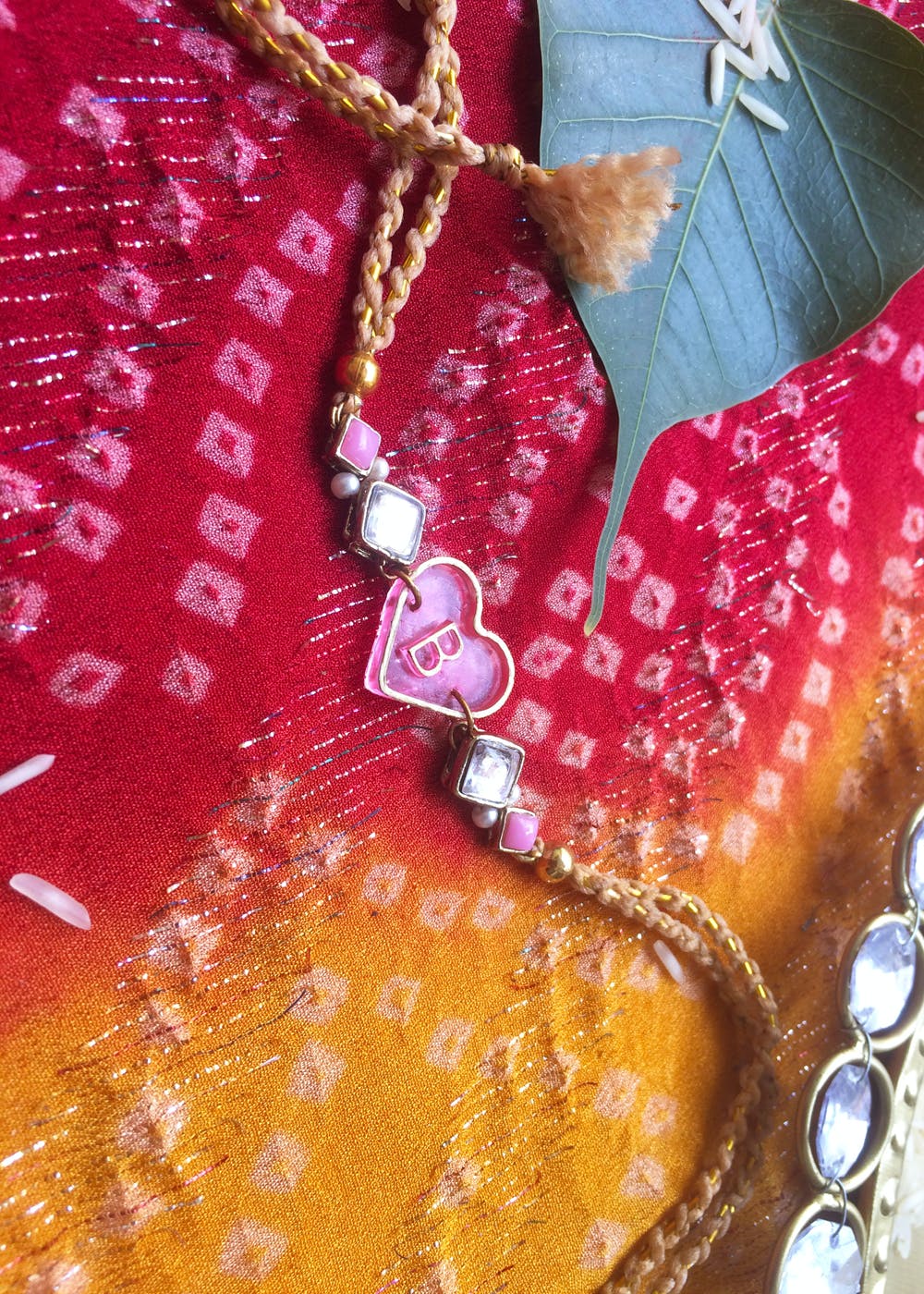 Get Personalized Initial Handmade Pink Rakhi at ₹ 349 | LBB Shop