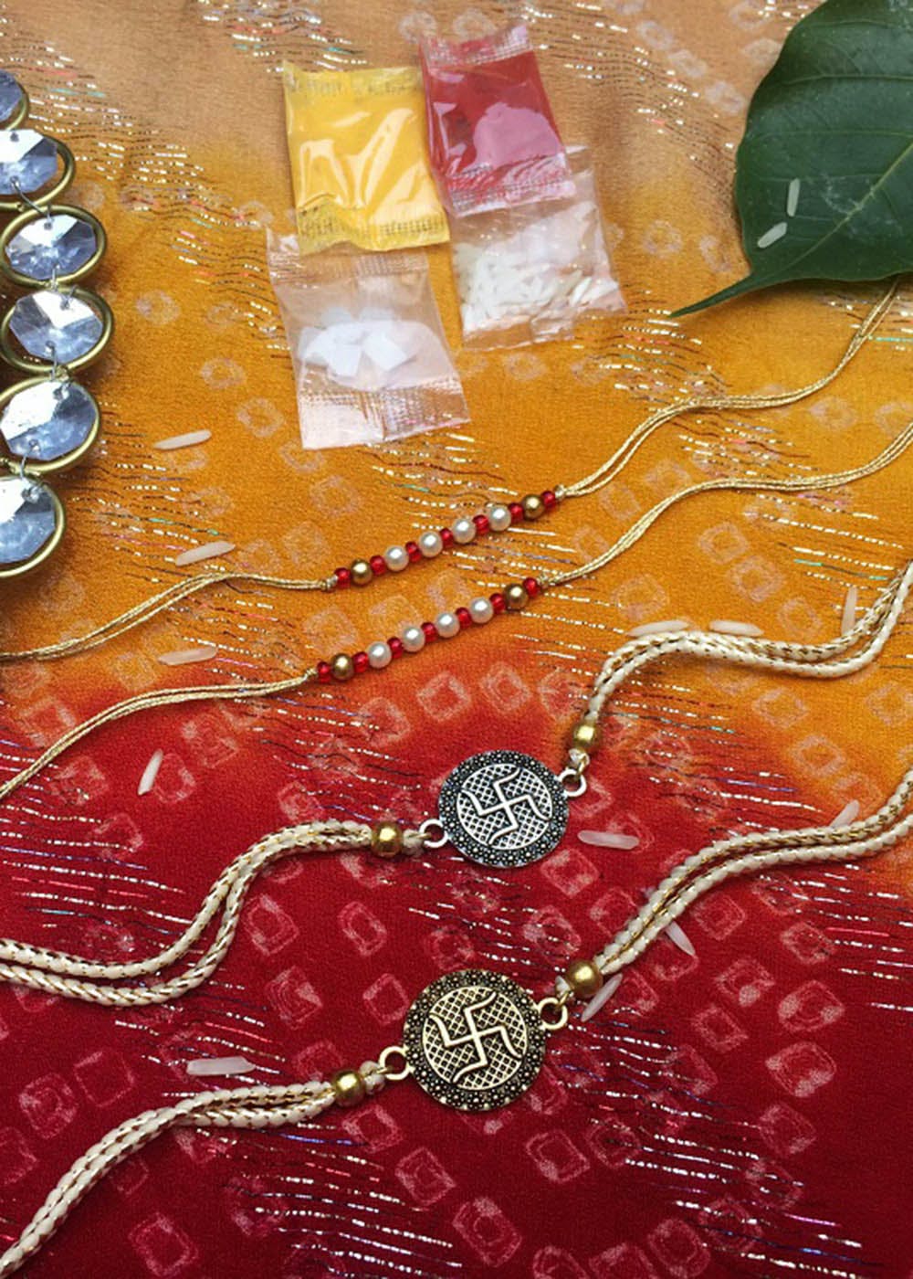 Get Golden and Silver Swastika/Satya Coin Rakhi and Dhaaga Combo - Set ...