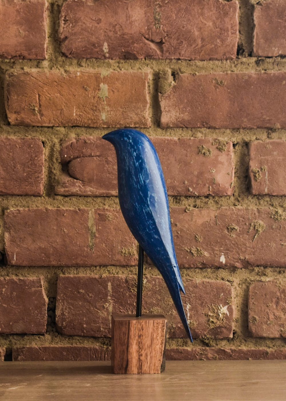 Get Solitary Dark Blue Bird Perched On Wooden Block Table Art at ₹ 1600 ...
