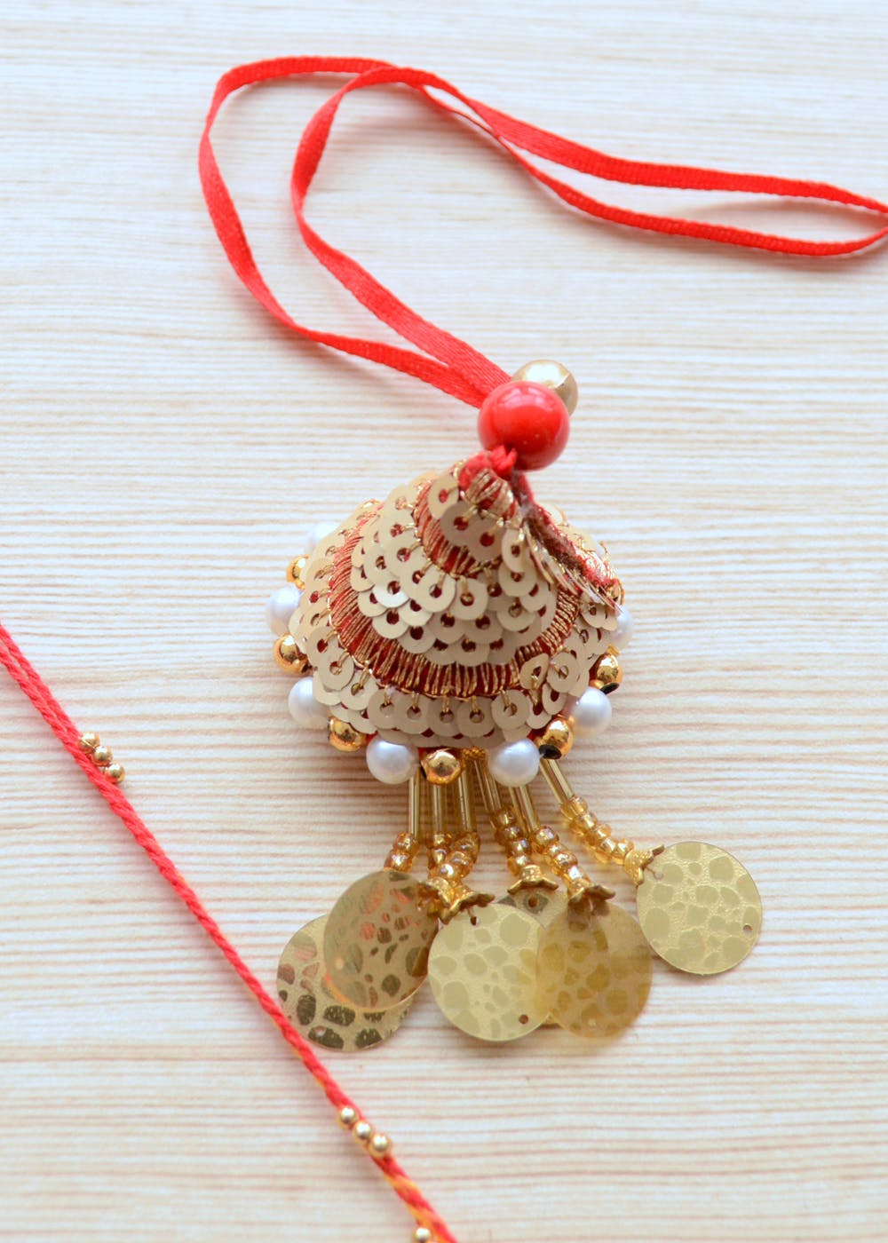 Get Red And Gold Traditional Lumba And Thread Mauli Rakhi Set For ...