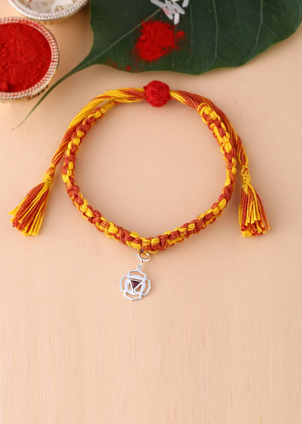 Get Muladhara Chakra Rakhi With Gemstone - Silver at ₹ 1050 | LBB Shop