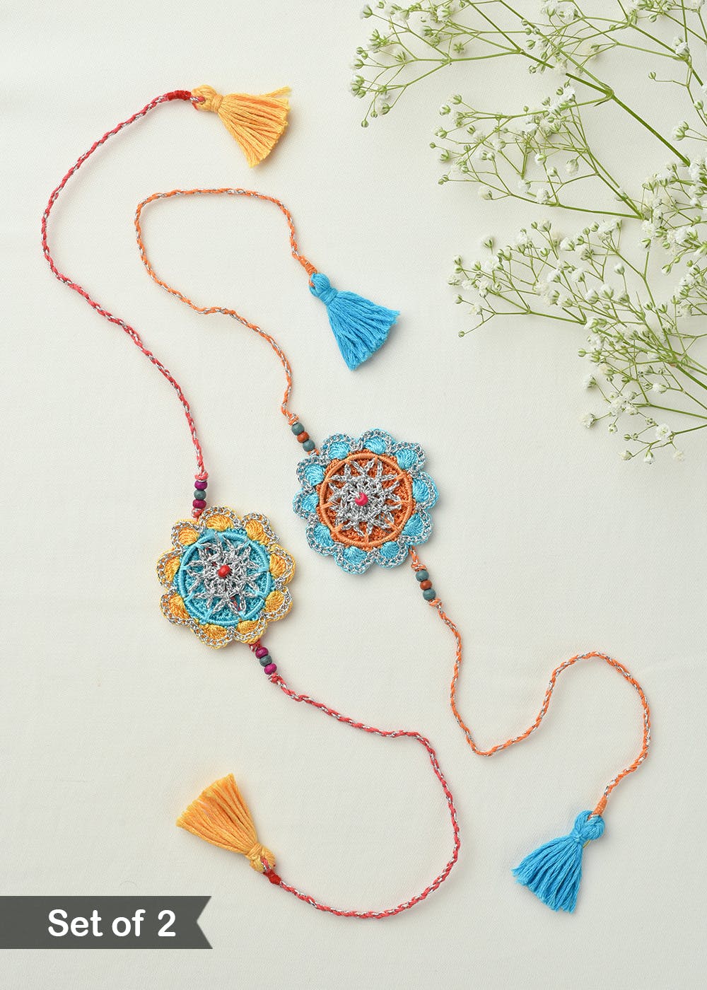 Get Handmade Recyclable Crochet Rakhi Set Palash (Set of 2) at ₹ 780 ...