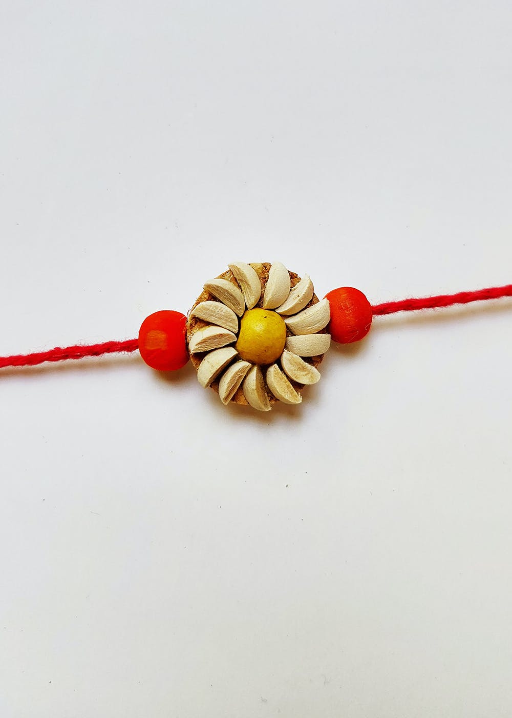 Get Surya Plantable Rakhi With Basil Seed at ₹ 199 | LBB Shop