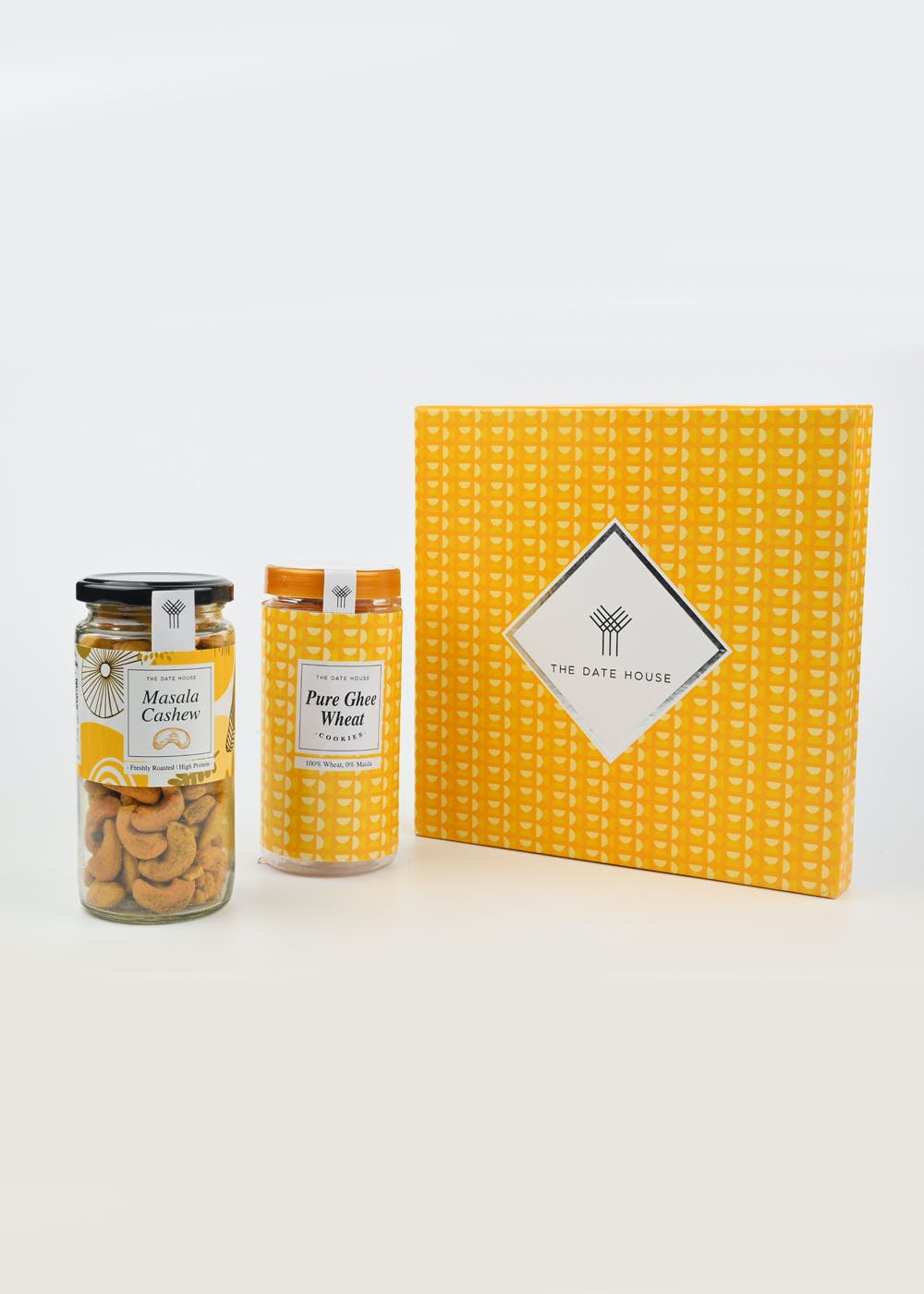 Get Sunshine Yellow Gift Hamper - 16 Pcs Filled Dates, Jaggery Cookies ...