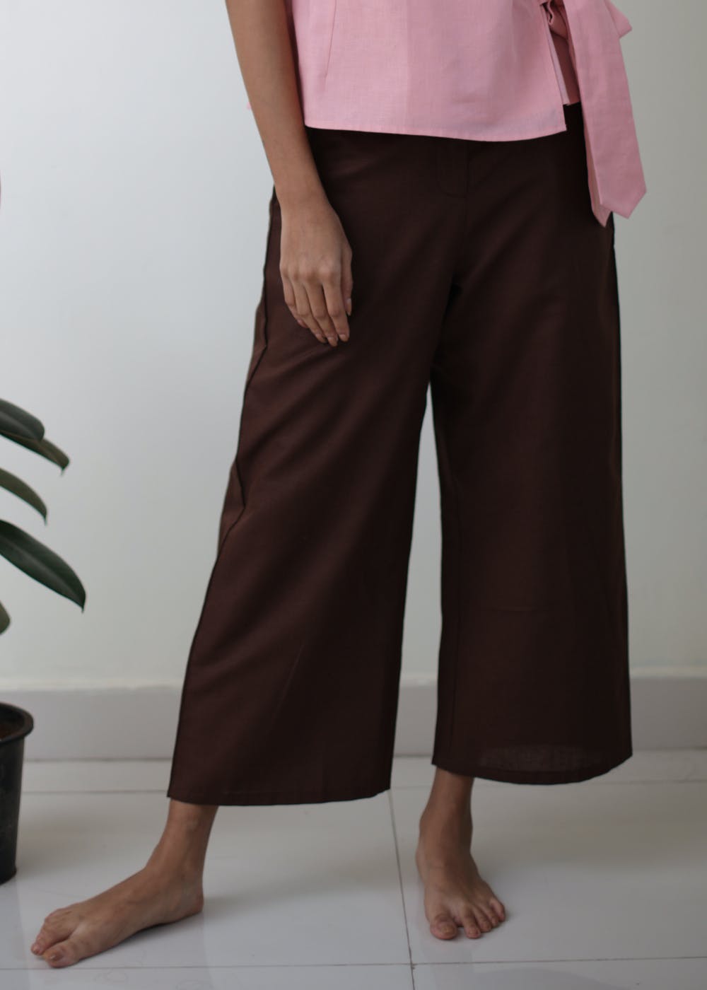 Get Solid Classic Brown Flared Pants at ₹ 2790 | LBB Shop