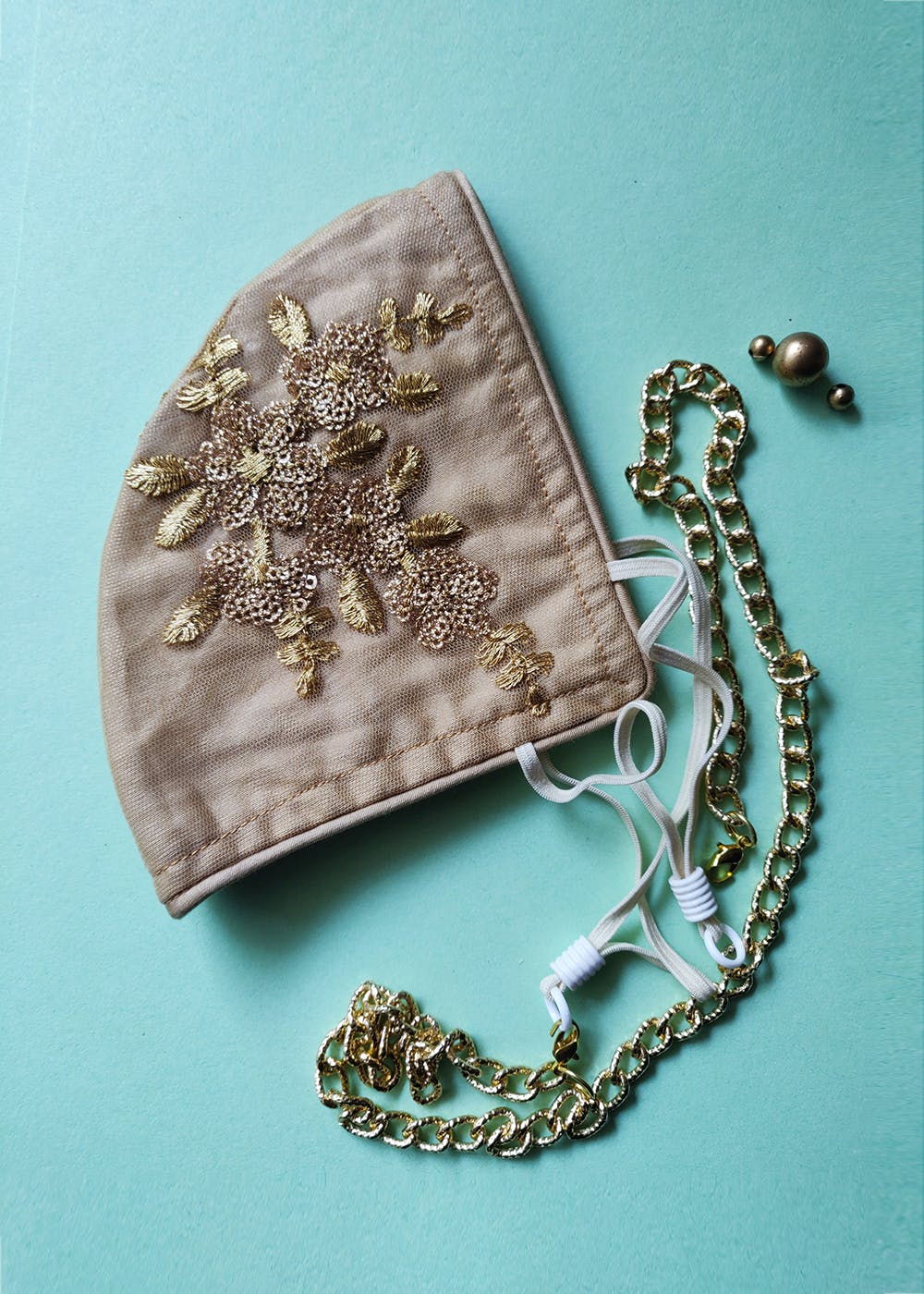 Get Golden Floral Embellished Face Mask With Golden Chain at ₹ 650 ...