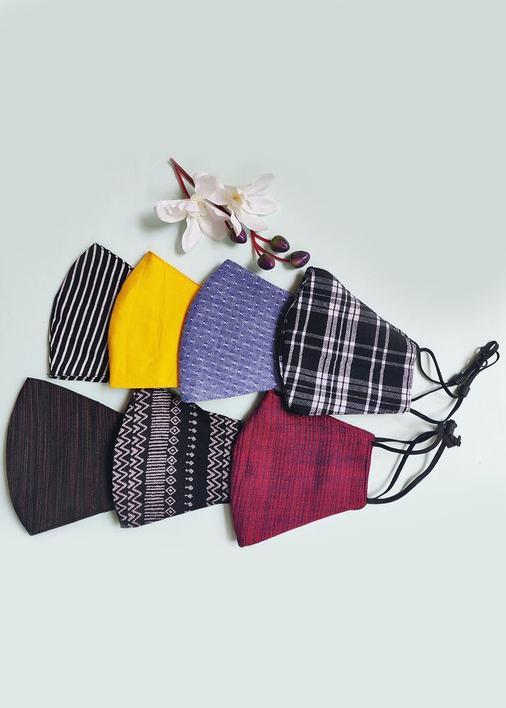 Get Set of 3 Assorted Triple Layer Masks Adjustable Straps at ₹ 499 ...