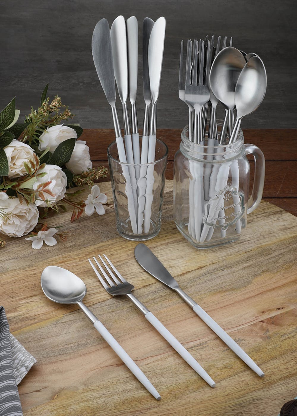 Get Radiant White Handle Matt Steel Cutlery Set Of Eighteen - Spoons ...